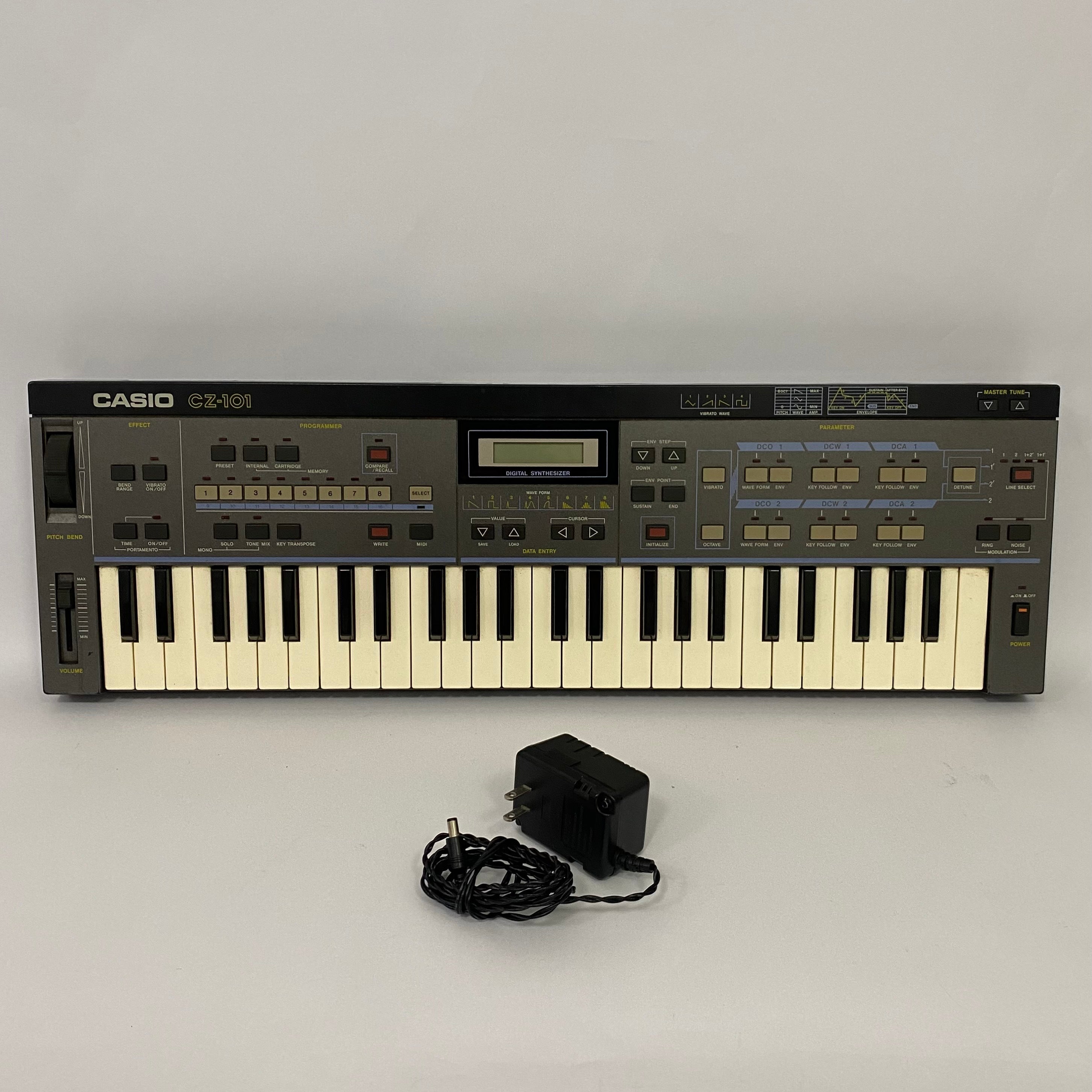 Used Casio CZ-101 with RA-3 RAM Cartridge and Book